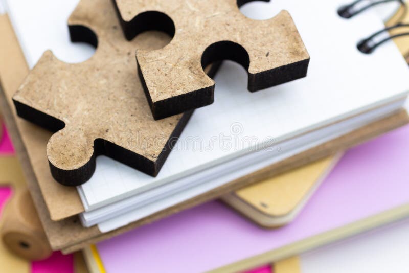 Jigsaw Puzzle Piece on the Stack of Books, Image Use for Solving ...