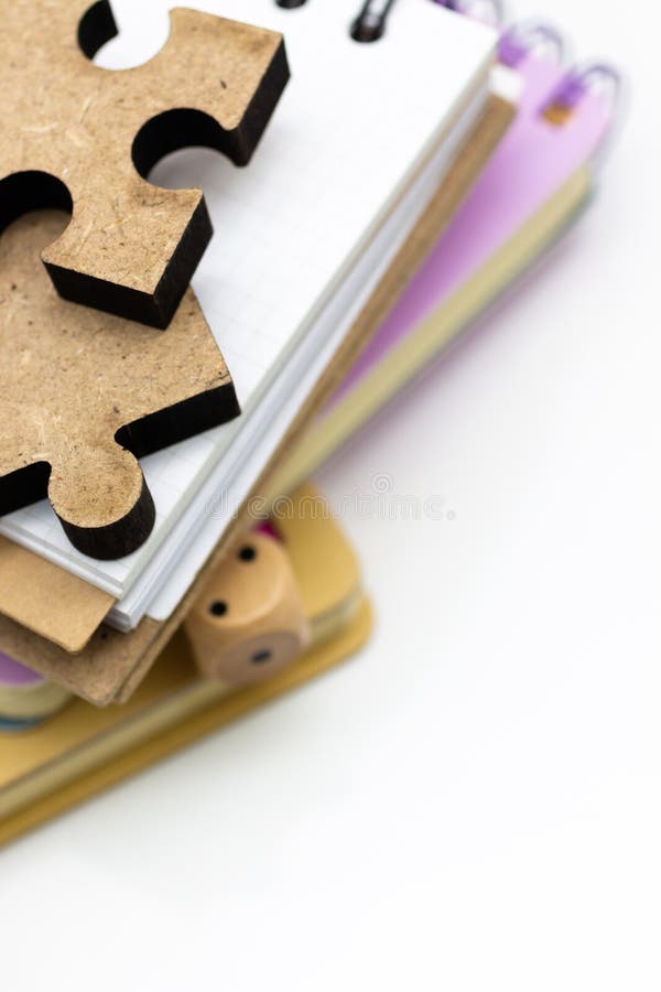 Jigsaw Puzzle Piece on the Stack of Books, Image Use for Solving ...