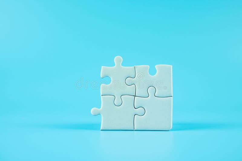 Jigsaw Puzzle Pieces on Blue Background with Copy Space for Text ...