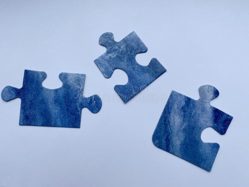 Jigsaw Puzzle Teamwork Concept Disassembled on Blue Background Stock ...