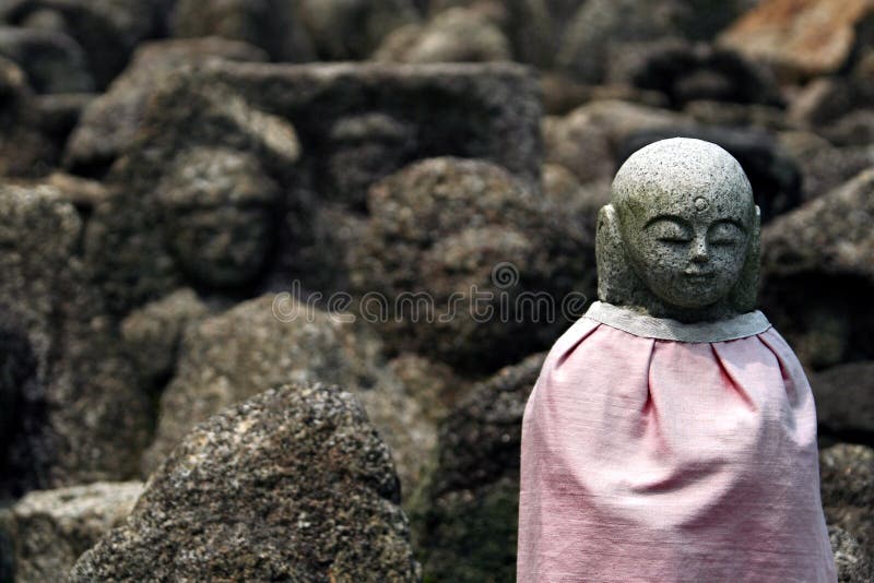 Jizo in the rocks stock image. Image of culture, saint - 1501721