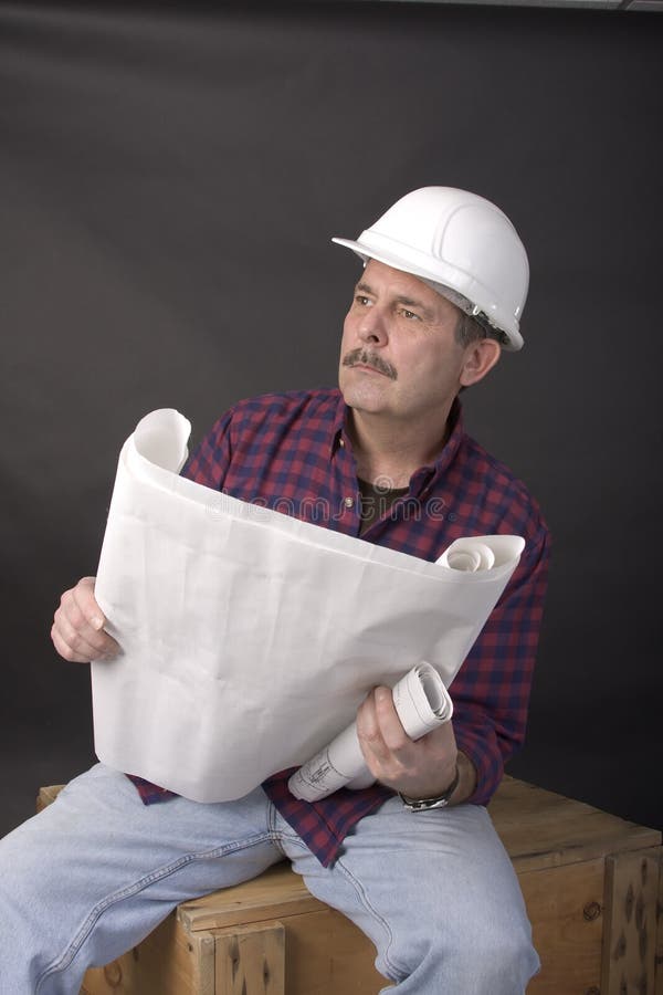 Contractor Shopping Lumber stock photo. Image of renovate - 2176316