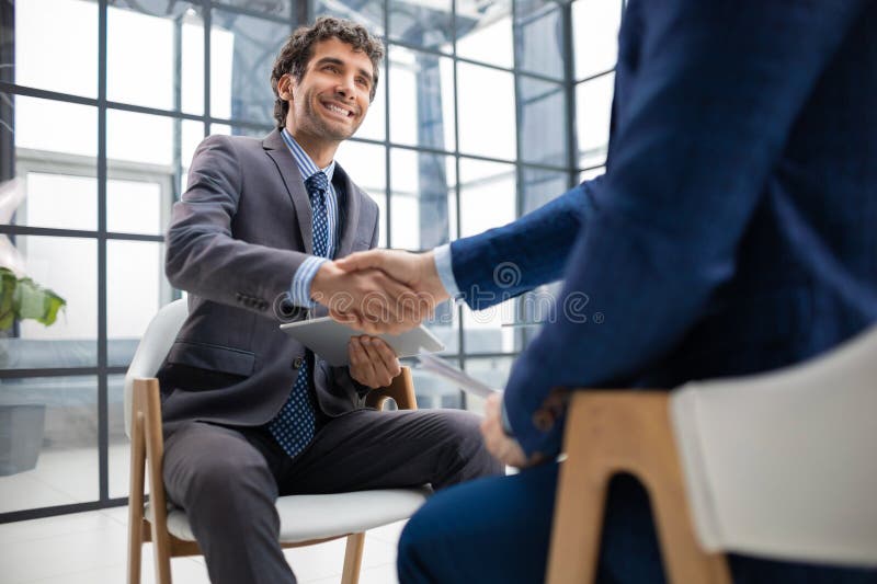 Job Applicant Having Interview. Handshake while Job Interviewing. Stock ...