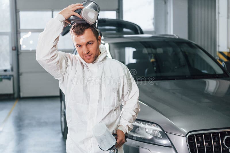 Job is Done. Man in Uniform is Working in the Auto Service Stock Image ...