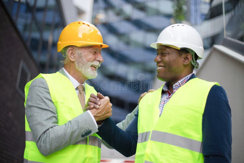 Mature Engineer Discussing the Structure of the Building with ...