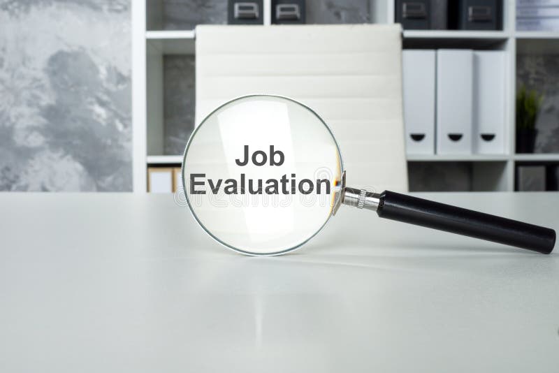 Job Evaluation Concept. Office Workstation and Magnifying Glass. Stock ...