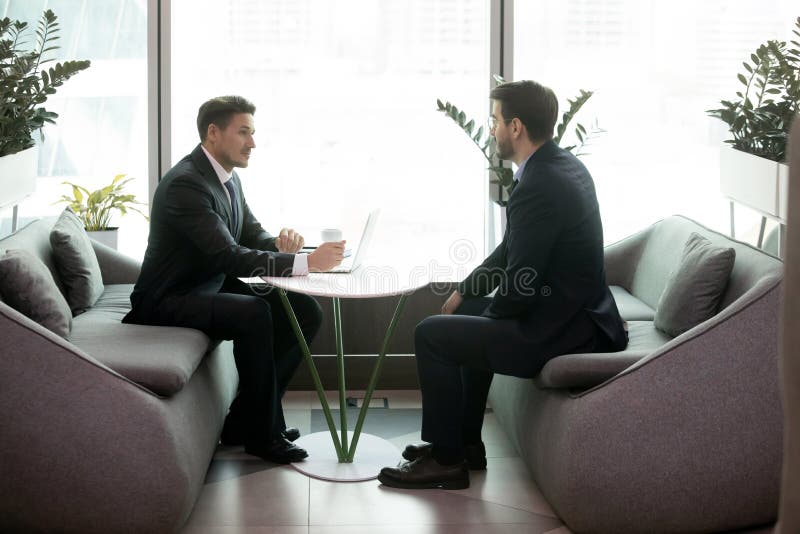 HR Manager Communicates with Applicant during Job Interview in Office ...