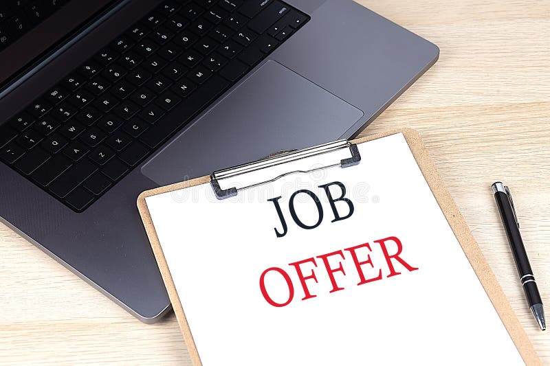 JOB OFFER Text Written on a Paper Clipboard on Laptop Stock Photo ...