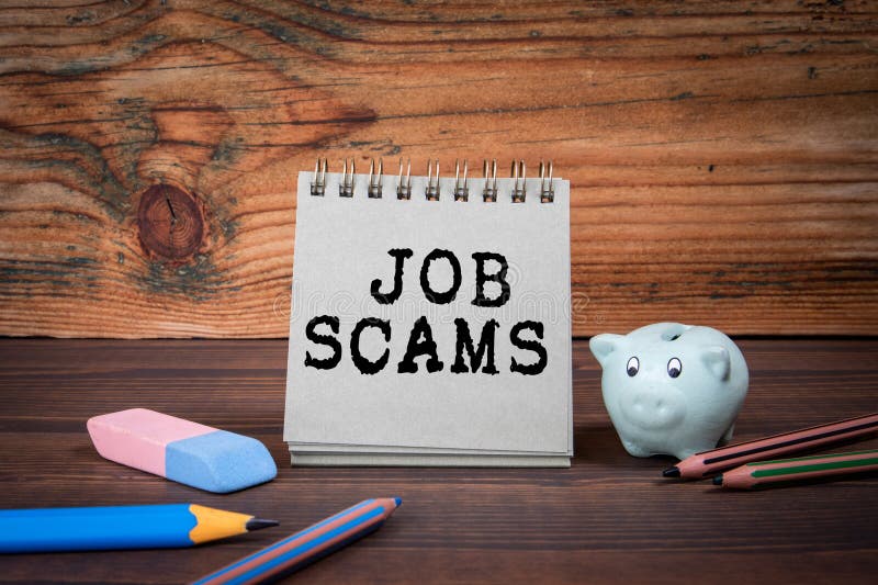 Job Scams. Cardboard Notepad on Wooden Texture Table Stock Photo ...