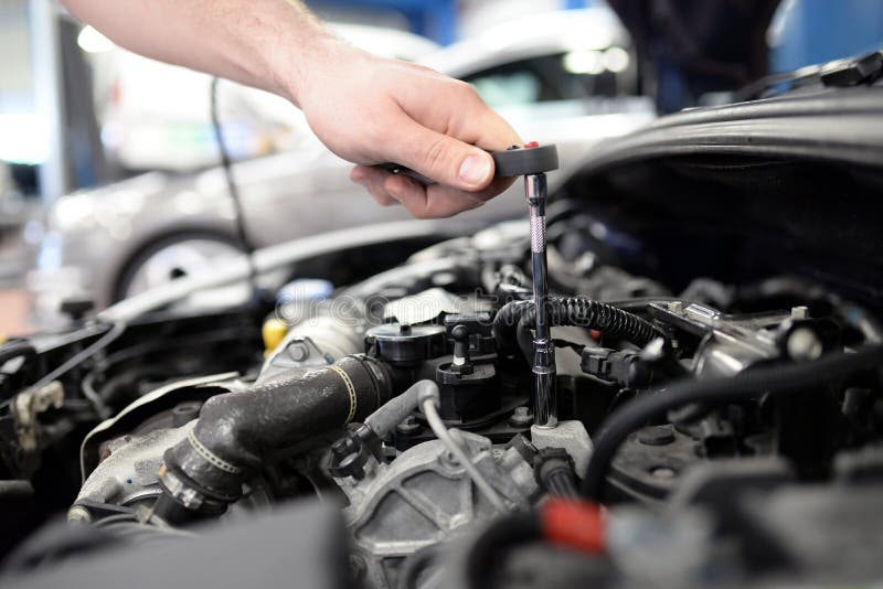 Job and Workplace - Mechanic in a Workshop Repairing a Car Stock Image ...
