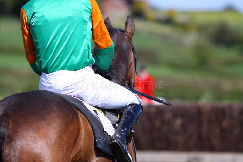 Jockey op raspaard a stock foto. Image of kleuren, snelheid - 30965046