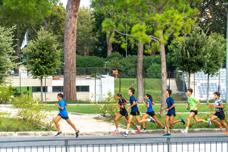 Joggers running editorial stock photo. Image of healthy - 129359533