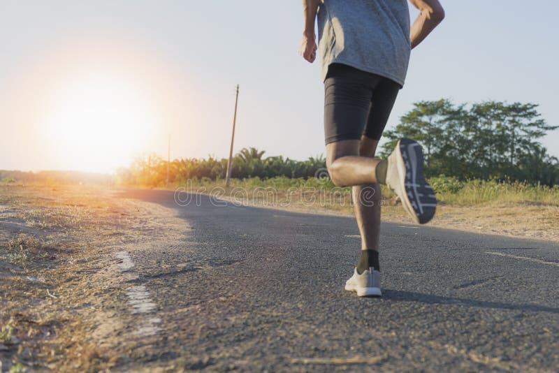 The Silhouette of a Man Running is Exercising the Evening Stock Image ...