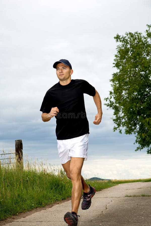 Jogging man stock photo. Image of field, adult, summer - 20489048