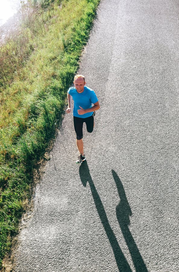 Jogging Man Top View Portrait Stock Image - Image of outdoor, nature ...