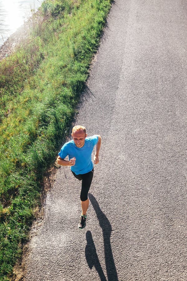 Jogging Man Top View Portrait Stock Image - Image of green, fitness ...