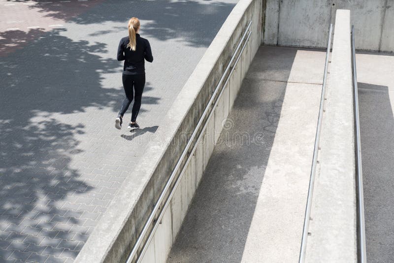 Jogging on pavement stock photo. Image of city, active - 68390244