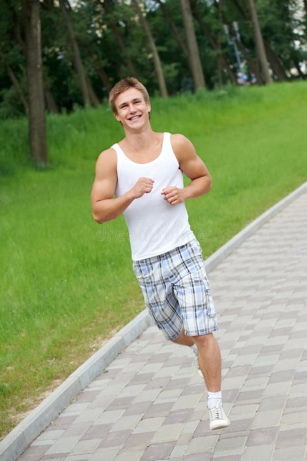 Young man jogging stock image. Image of training, fresh - 15080191