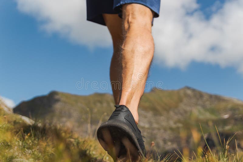 Strong Man Legs Walking on Trail in the Mountains Stock Image - Image ...