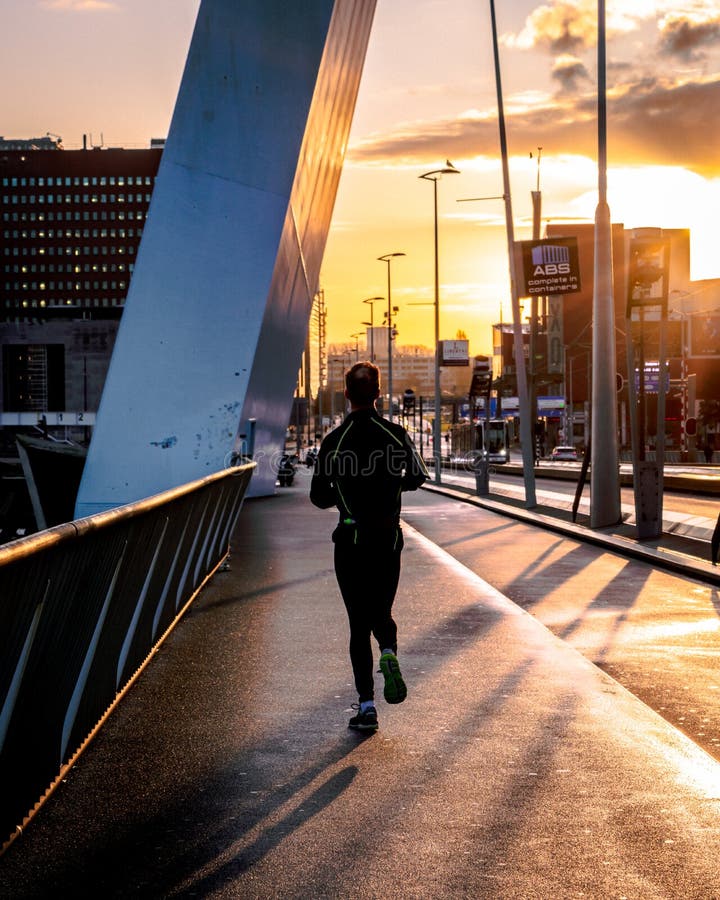 Jogging during sunrise editorial photography. Image of jogging - 208961422