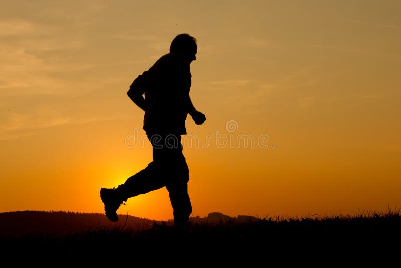 Jogging in the sunset stock image. Image of healthy, endurance - 21399437
