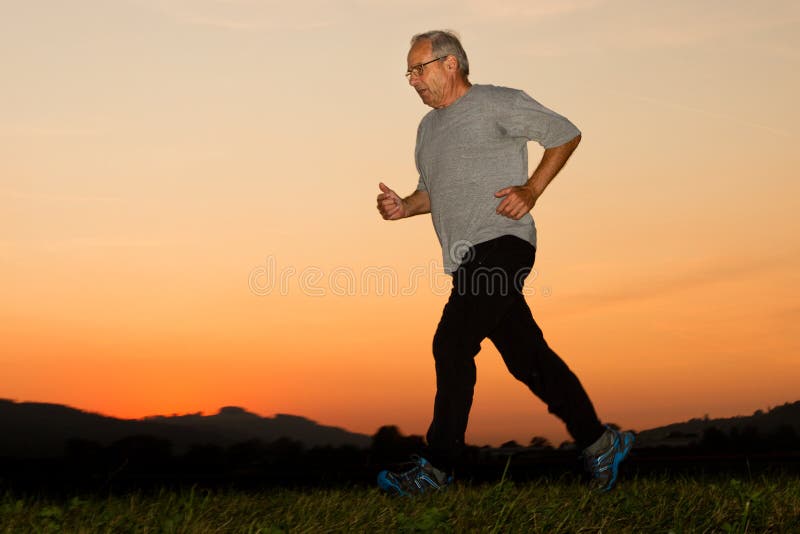 Jogging in the sunset stock photo. Image of shadow, lifestyle - 21399482