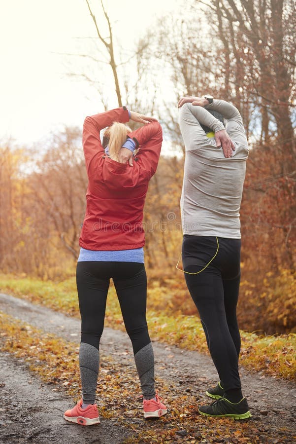 Jogging Time during the Autumn Stock Image - Image of hand, fall: 96375057
