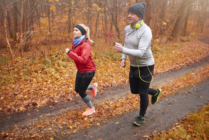 Jogging Time during the Autumn Stock Photo - Image of away, outdoors ...