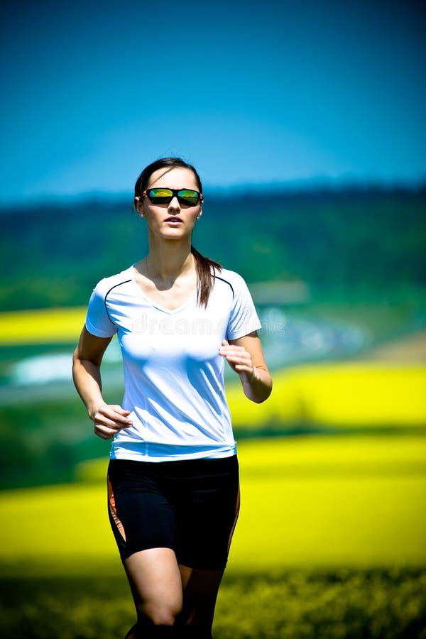 Jogging woman stock photo. Image of jogging, people, action - 14699532