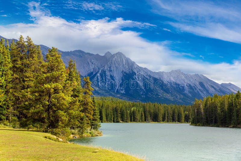 Johnson lake in Banff stock photo. Image of cloud, panoramic - 259834670