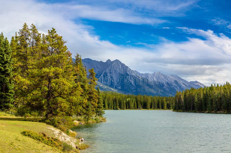 Johnson lake in Banff stock image. Image of mountain - 278713917