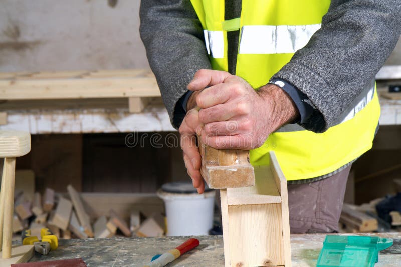 Joiner in his workshop stock photo. Image of woodworking - 72047856