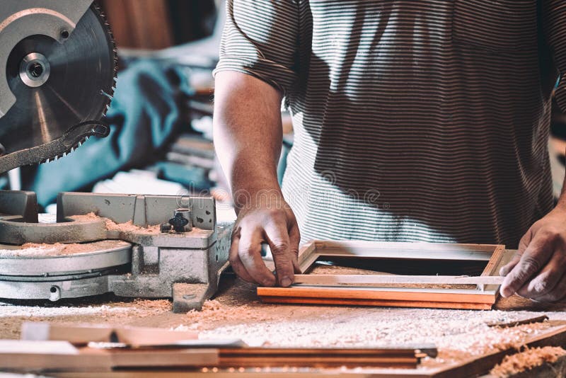 The Joiner Makes the Product Frame for the Painting. Stock Photo ...