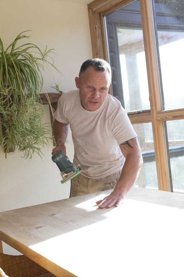 Joiner Using a Sander on a Table Surface Stock Photo - Image of ...