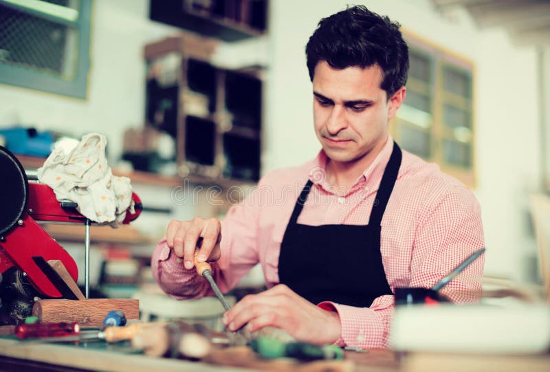 Joiner working in workshop stock image. Image of craftsman - 269298217