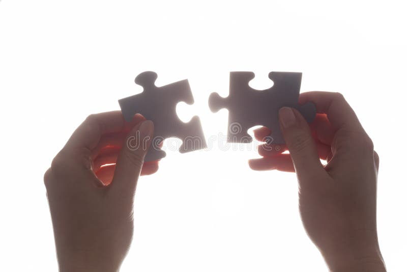 Joining Two Pieces of Jigsaw Puzzle. Solution, Business. Stock Photo ...