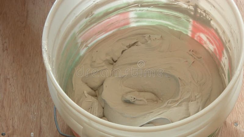 Joint Compound in Mud Bucket Stock Footage - Video of refurbishing ...