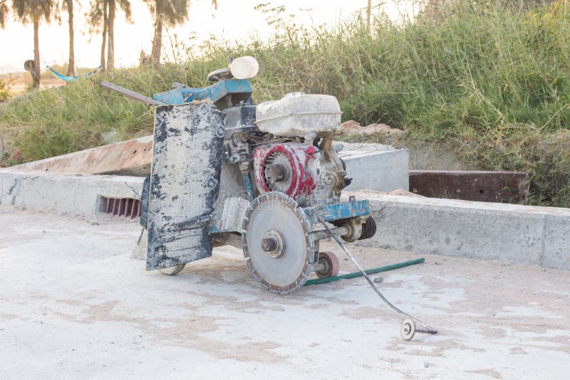 The Joint Cutter Machine on a Brushed Concrete Surface. Construction ...