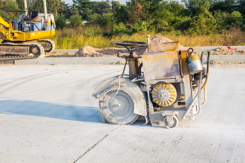 The Joint Cutter Machine on a Brushed Concrete Surface. Construction ...