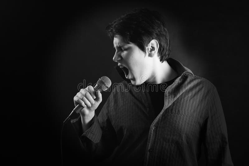 Jonge Mensenzanger Met Microfoonuitdrukking Stock Afbeelding - Image of ...