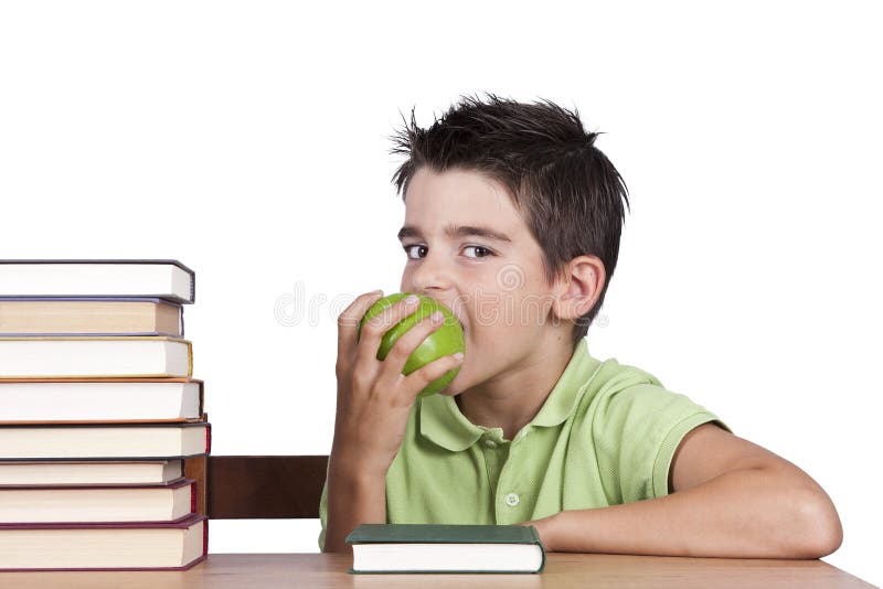 Jongen Achter Een Schoolbank Die Fruit Eet Stock Afbeelding - Image of ...