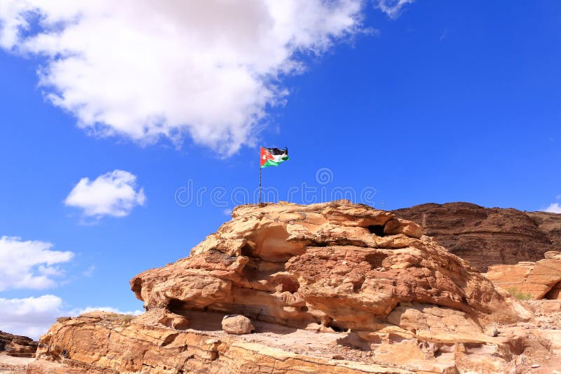 Jordan Flag at the Area of Wadi Musa, Petra, Jordan Stock Photo - Image ...