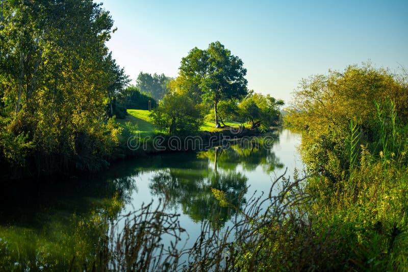 The Jordan River in Northern Israel Stock Photo - Image of landscape ...