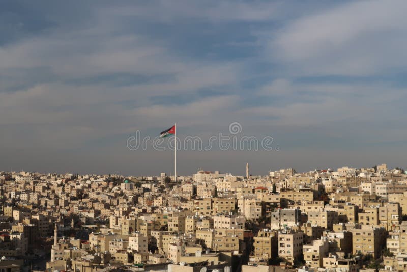 Jordanian Flag Over the Skyline of Amman, Jordan Stock Photo - Image of ...