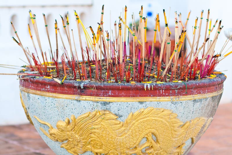 Joss-sticks on Joss Pot with Yellow Dragon Stock Photo - Image of burn ...