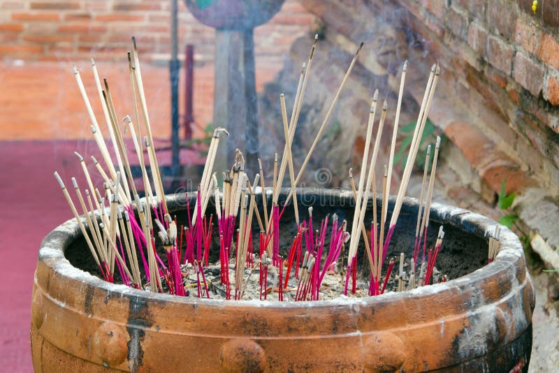 Joss Sticks in the Powder Container in an Old Temple in Thailand Stock ...