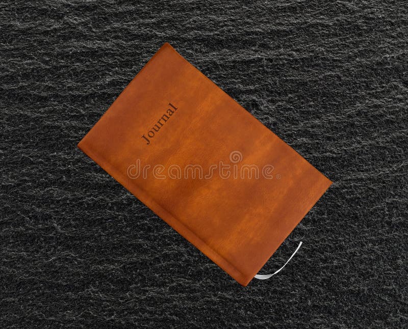 Journal on a Black Slate Table Stock Photo - Image of brown, workbook ...