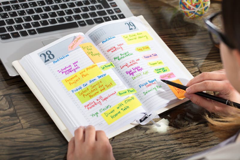 Journal Intime De Writing Schedule in D'homme D'affaires Image stock ...