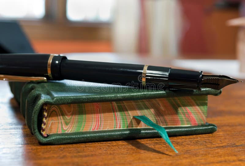 Journal and pen on desk stock image. Image of antique - 17914223