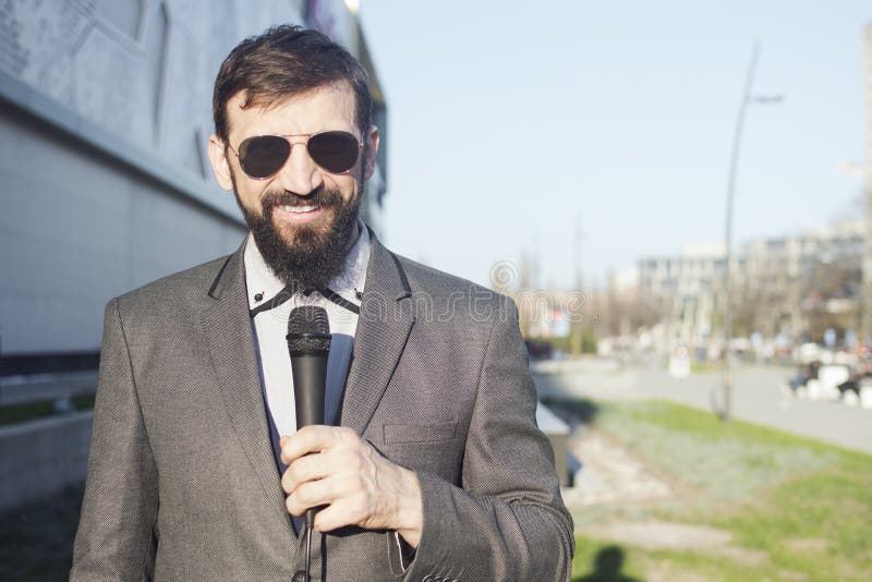Journalist in live program stock photo. Image of smiling - 148161316
